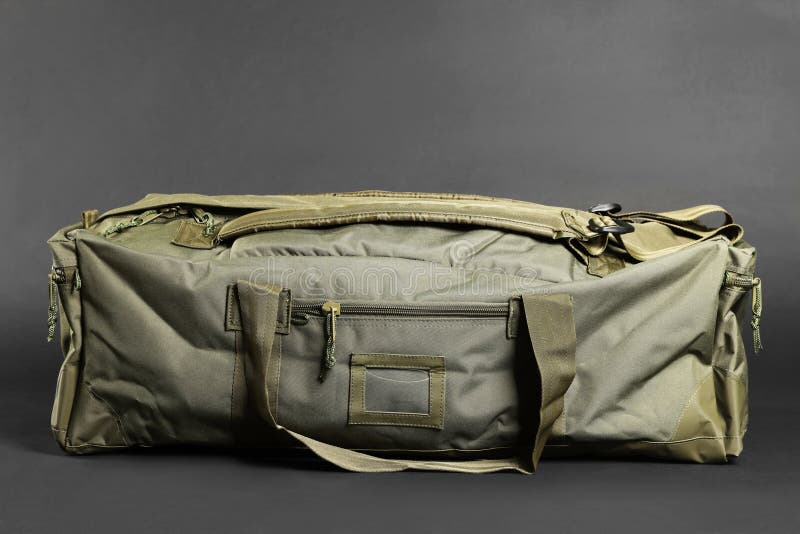 Army Bag on Dark Grey Background. Military Equipment Stock Photo ...