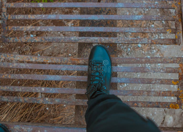 Army boot on rusty stairs stock photo. Image of boots - 255713394