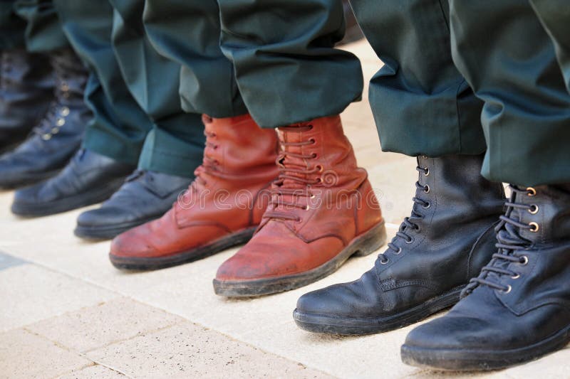 Army Boots Stand Out in a Crowd Stock Photo - Image of black, concept ...