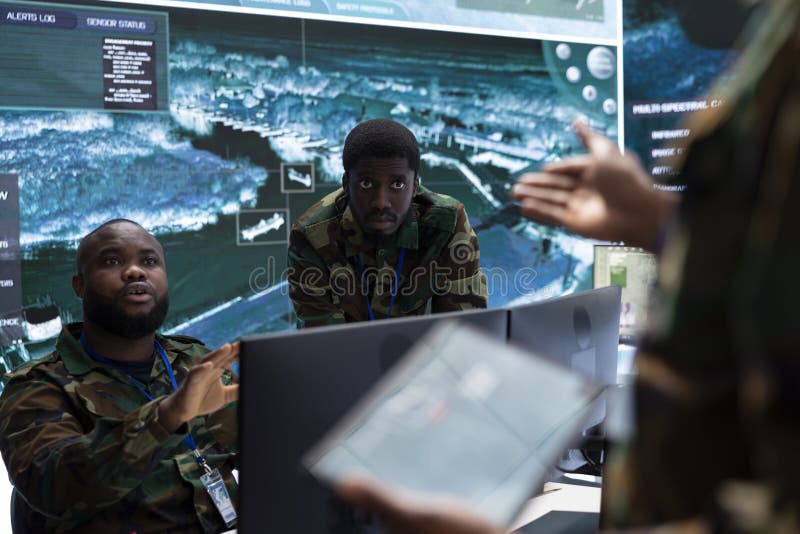 Army Professionals in Command Post Overseeing Satellite Data and ...
