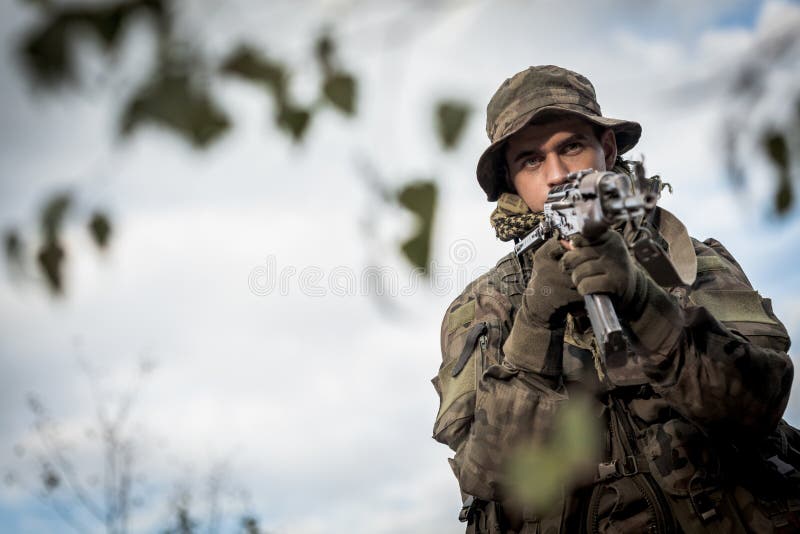 Army soldier with a weapon stock photo. Image of guard - 60803638