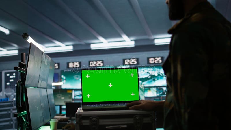 Army Specialist Operating Surveillance Tech with Chroma Key Laptop ...