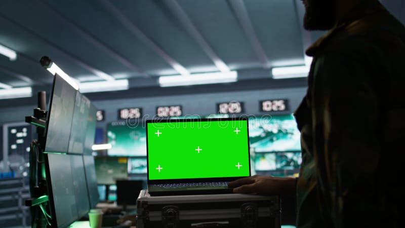 Army Specialist Operating Surveillance Tech with Chroma Key Laptop ...