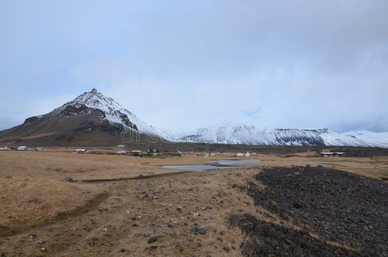 Arnarstapi Fishing Village at the Base of a Volcanic Mountain Stock ...