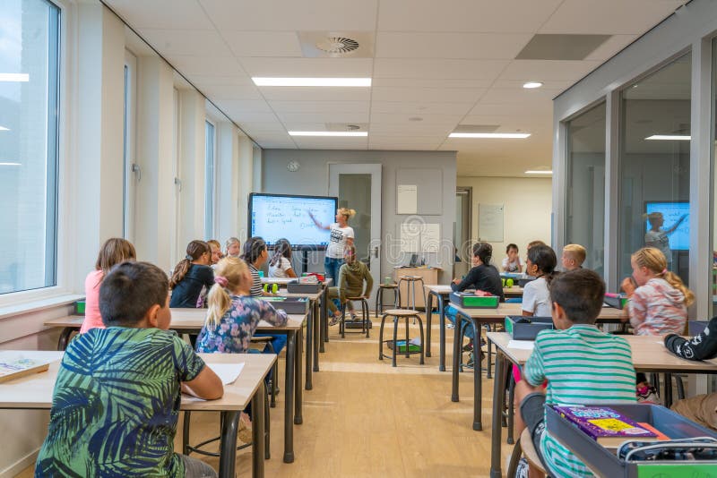 ARNHEM / NETHERLANDS - AUGUST 28 2020: Children in Primary School Work ...