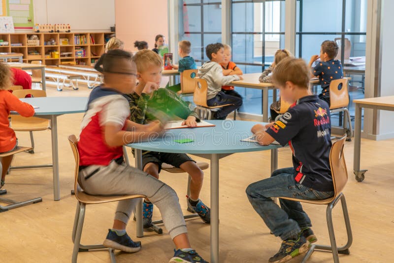 ARNHEM / NETHERLANDS - AUGUST 28 2020: Children in Primary School Work ...