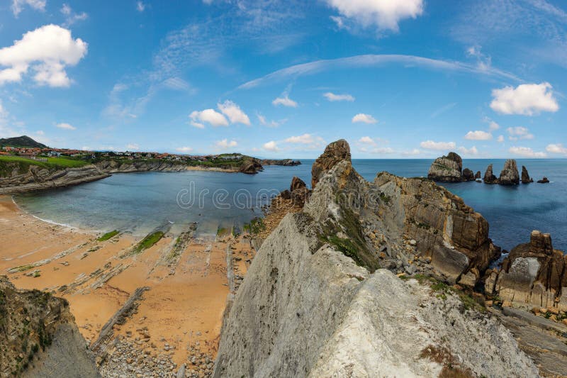 Arnia Beach (Spain). Atlantic Ocean Coastline Landscape Stock Photo ...