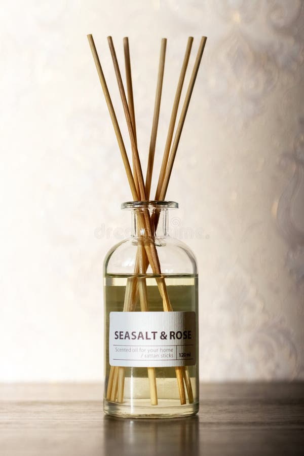An Aroma Diffuser with Aromatic Oil and Sticks in the Room Creates an ...