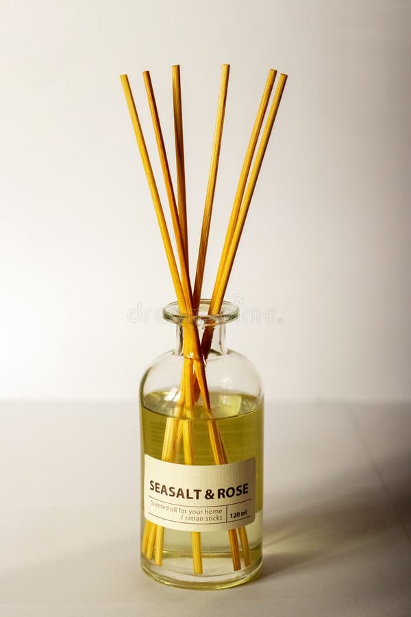 An Aroma Diffuser with Aromatic Oil and Sticks in the Room Creates an ...
