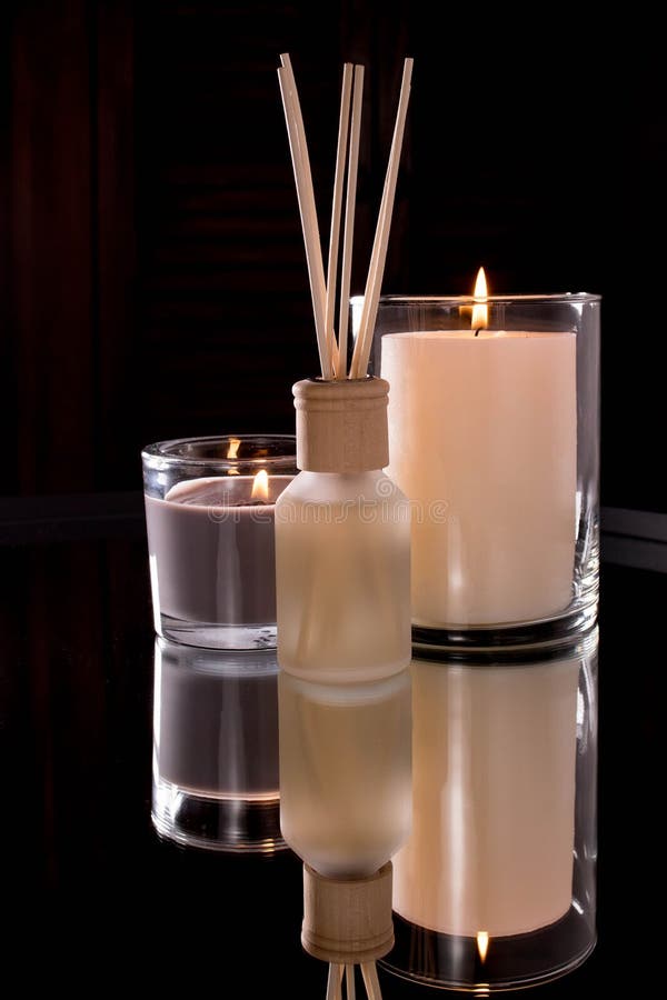 Aroma Diffuser and Scented Candles on Table with Reflectio. Romantic ...