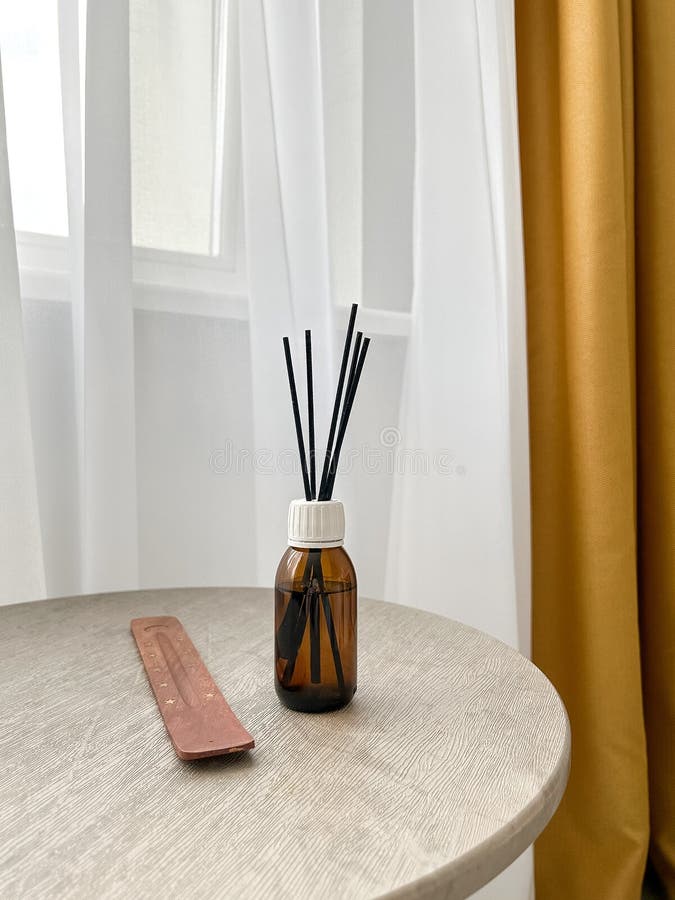 Aroma Diffuser on the Table, Against the Background of the Window ...