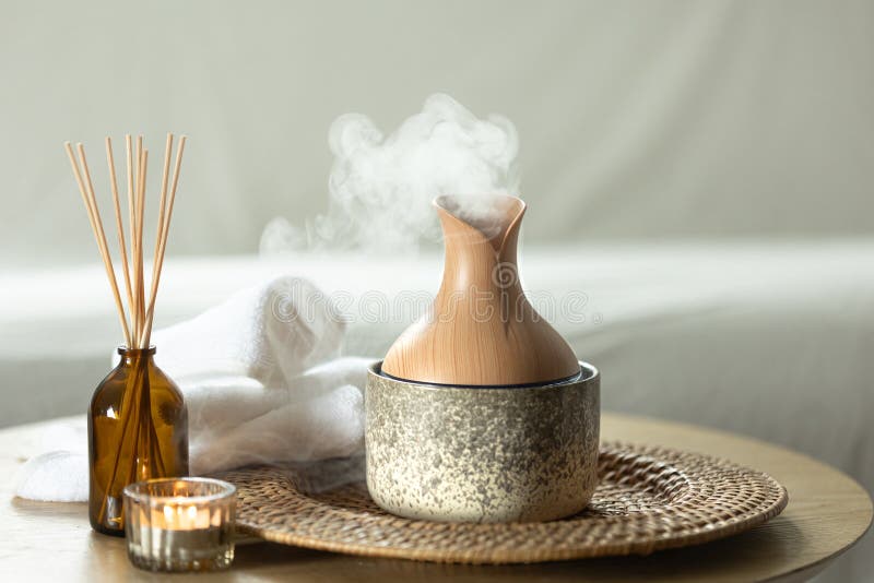 Aroma Oil Diffuser Lamp with the Sticks Perfume and Candle. Stock Photo ...