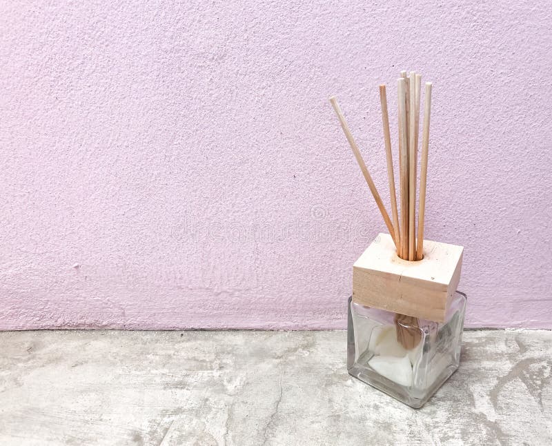 Aroma Reed Diffuser Against Pink Wall on Grey Cement Floor Stock Image ...