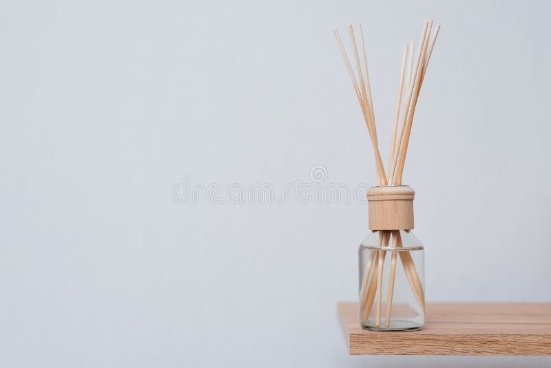 Aroma Sticks in Glass Bottle. Wooden Aroma Sticks in a Glass Flask ...