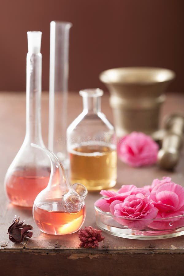Aromatherapy and Alchemy with Pink Flowers Stock Photo - Image of ...