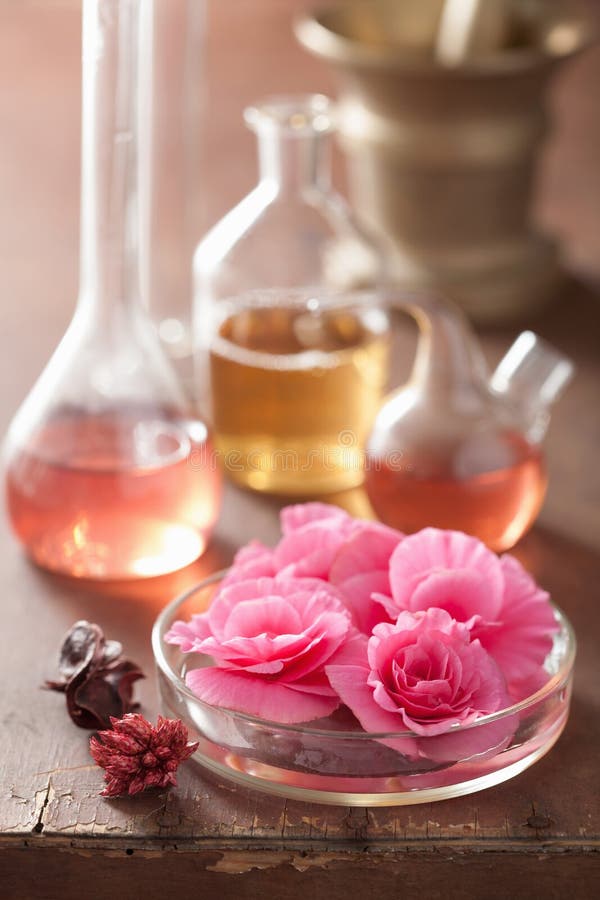 Aromatherapy and Alchemy with Pink Flowers Stock Photo - Image of ...