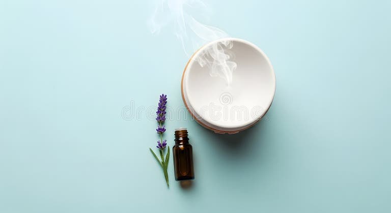Aromatherapy Diffuser with Lavender and Essential Oil on Light Blue ...
