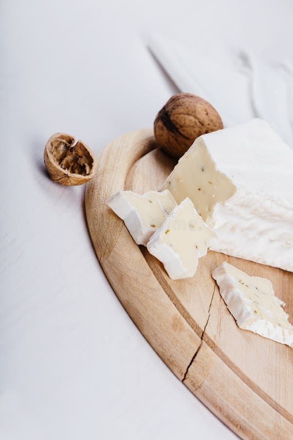 Aromatic Brie Cheese with Walntus Stock Image - Image of cream, light ...