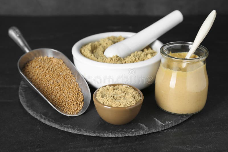 Aromatic Mustard Powder and Seeds on Table Stock Photo - Image of cook ...