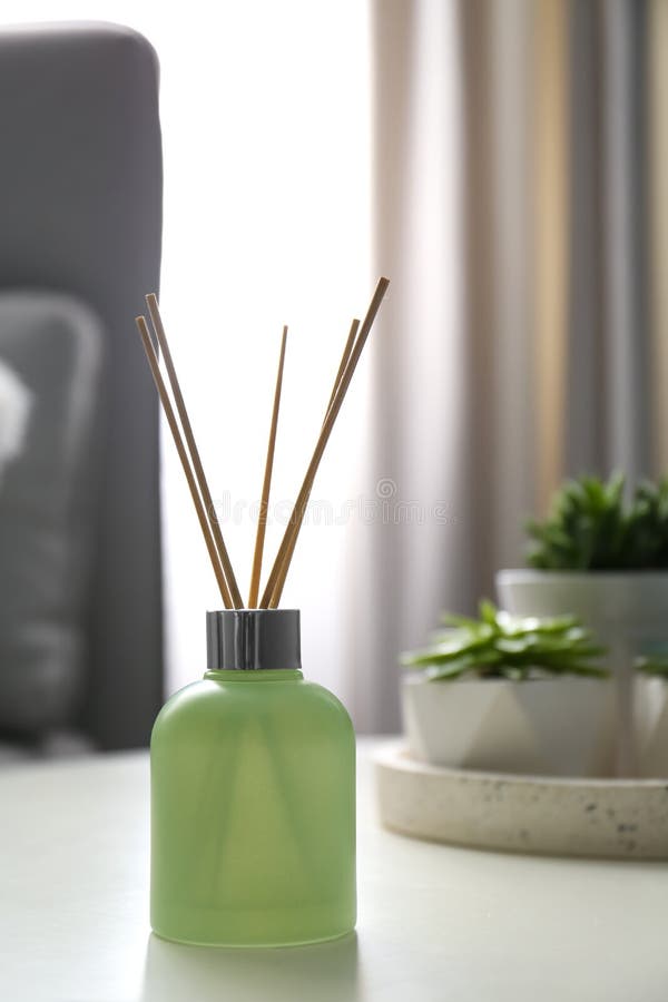 Aromatic Reed Air Freshener on White Table in Room Stock Image - Image ...