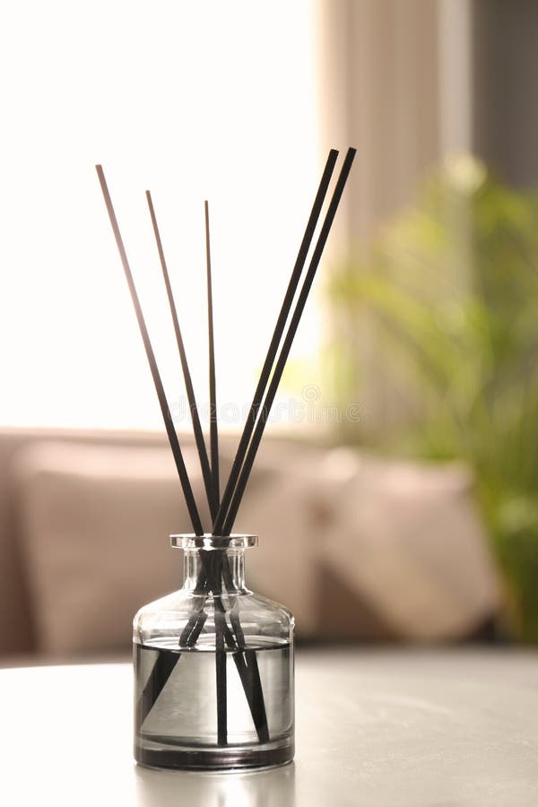 Aromatic Reed Air Freshener on White Table in Room Stock Photo - Image ...
