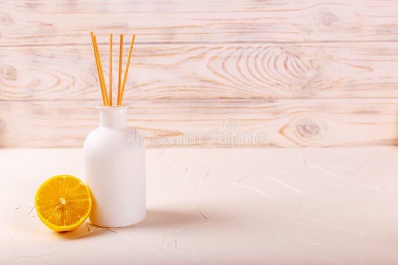 Aromatic Reed Diffuser with Lemon Stock Photo - Image of wooden ...
