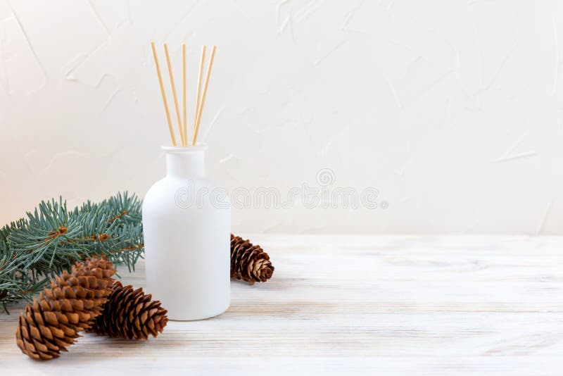 Aromatic Reed Diffuser with Sticks on a White Background with a ...