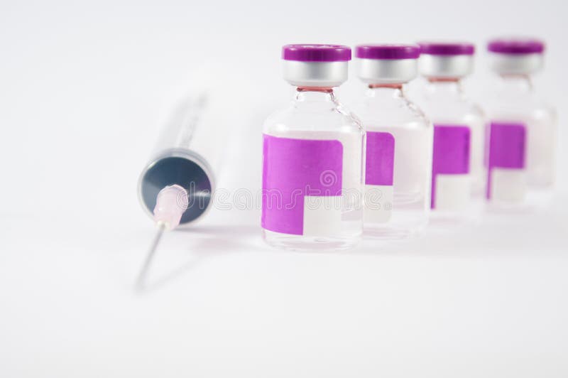 Arrange Purple Vial and Disposable Syringe on White Background Stock ...