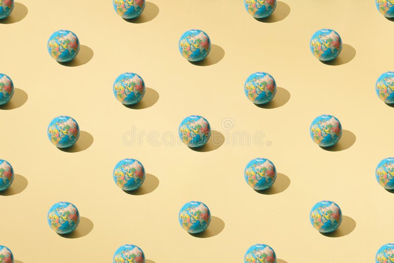 Arranged Globe on Yellow Cream Pastel Color. Minimal Pattern Stock ...