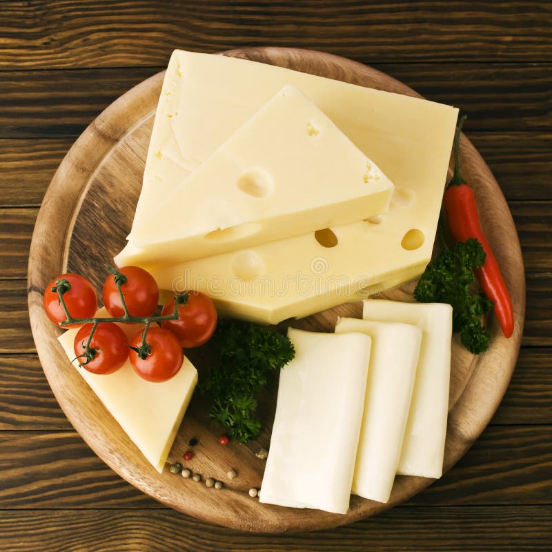 Arrangement with Appetizing Cheese on the Kitchen Cutting Board Stock ...