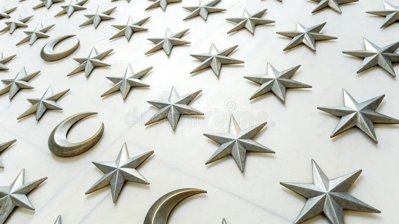 Arrangement of Silver Stars and Crescent Moons on a White Surface ...