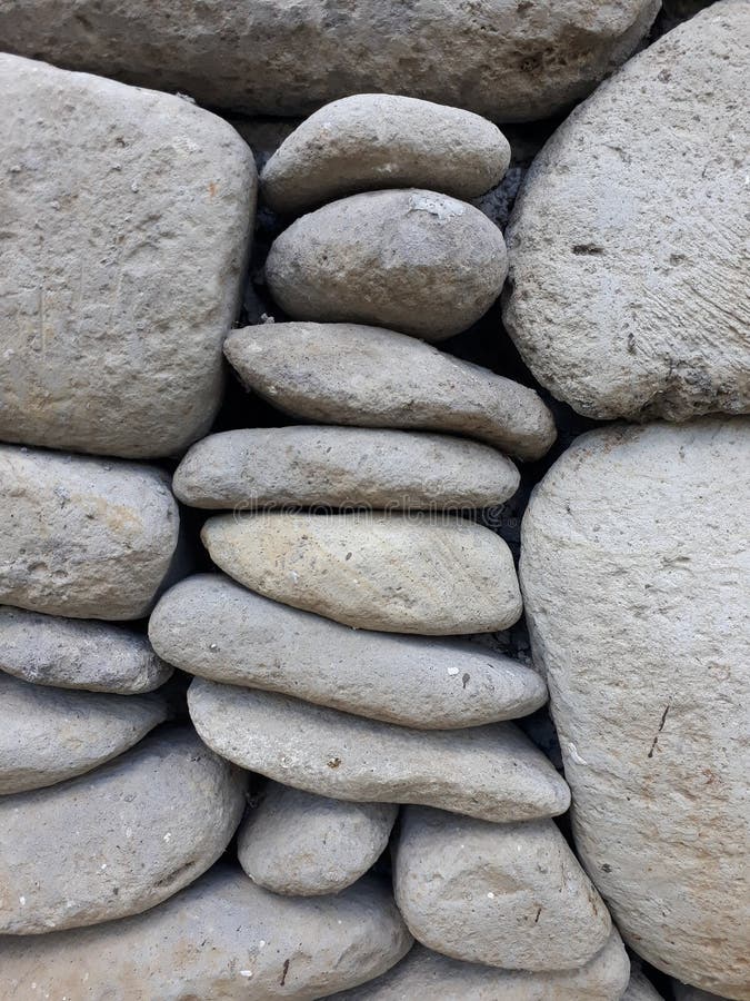 The Arrangement of Small and Large Stones for Wall Cladding Stock Photo ...