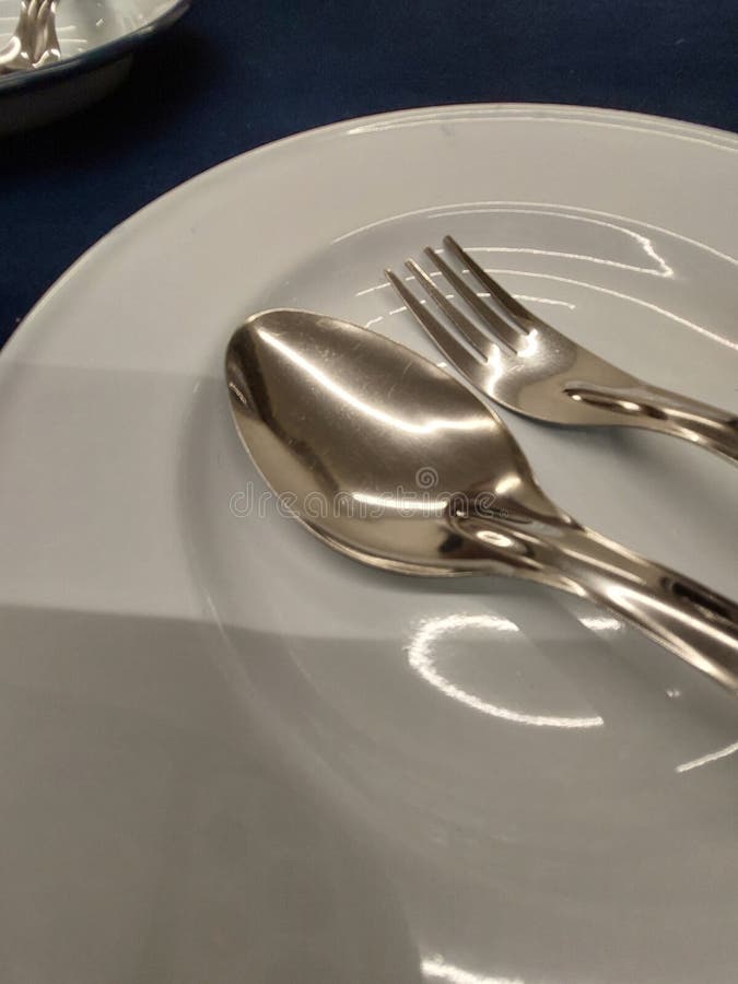 Arrangements of Spoon and Fork for Left-handed People. Stock Photo ...