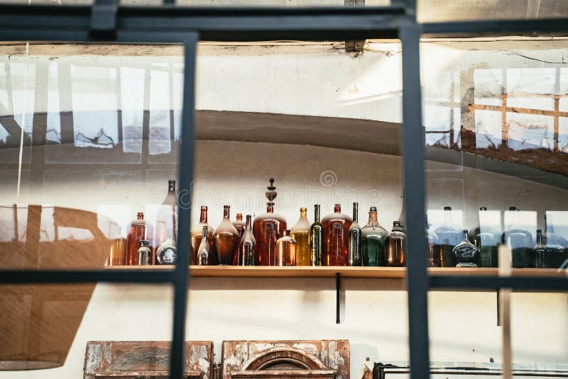 Array of Assorted Shapes of Bottle on a Shelf Stock Image - Image of ...