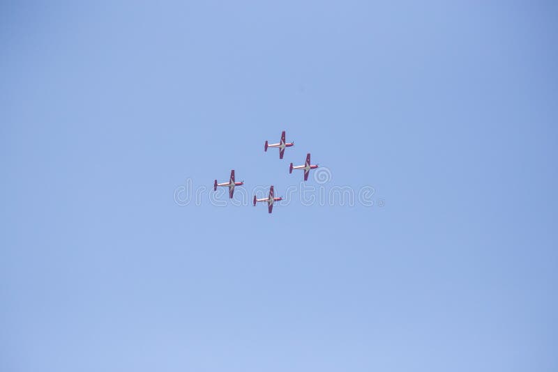 Four Aircraft Doing Aerobatic on Blue Cloudy Sky. Cuban Eight Aircraft ...