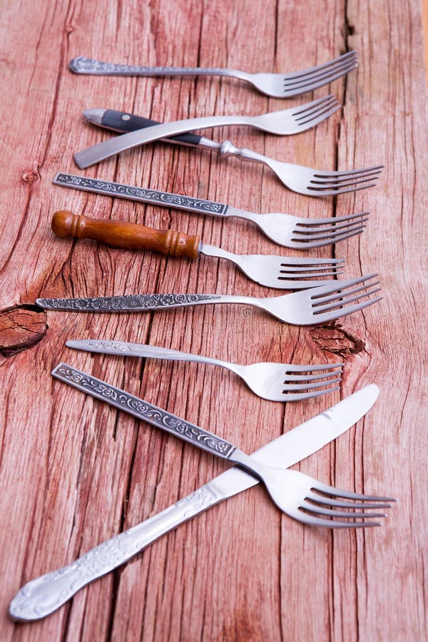Array of Rustic Forks and a Single Knife Stock Photo - Image of cooking ...
