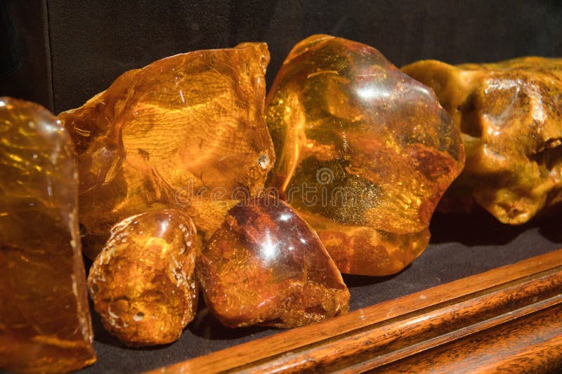 Array of Smooth Kauri Amber Stones on Display. Stock Image - Image of ...
