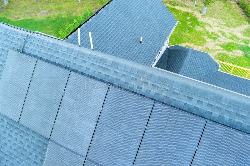 An Array of Solar Panels is Mounted on Roof of a House As Shown Stock ...
