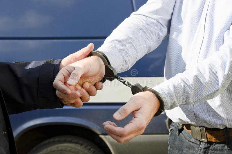 The arrest of a man stock image. Image of officer, offender - 39487125