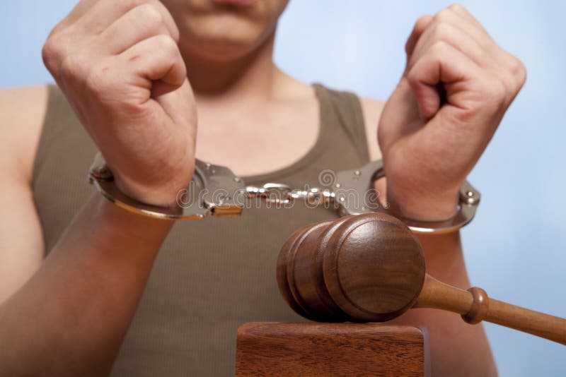 Handcuffs stock photo. Image of shackles, legal, gavel - 35887968