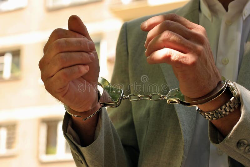 Arrested man stock image. Image of suit, jail, business - 1688163