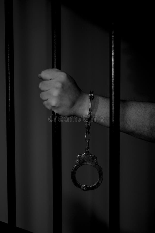 Arrested man in handcuffs stock image. Image of legal - 127322219