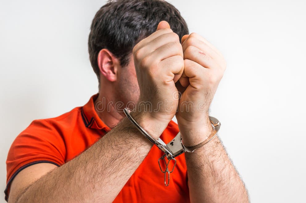 Arrested Man in Handcuffs Hidden His Face Stock Image - Image of ...