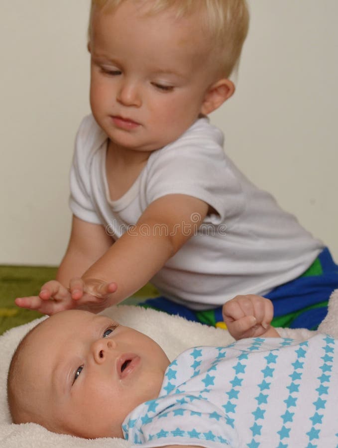 Arrival of a Younger Sibling Stock Photo - Image of sibling, like: 61603050