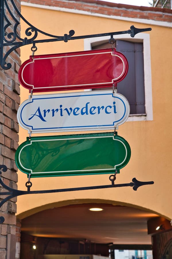 Arrivederci or Goodbye Sign in Italian Language and Italian Flag on a ...
