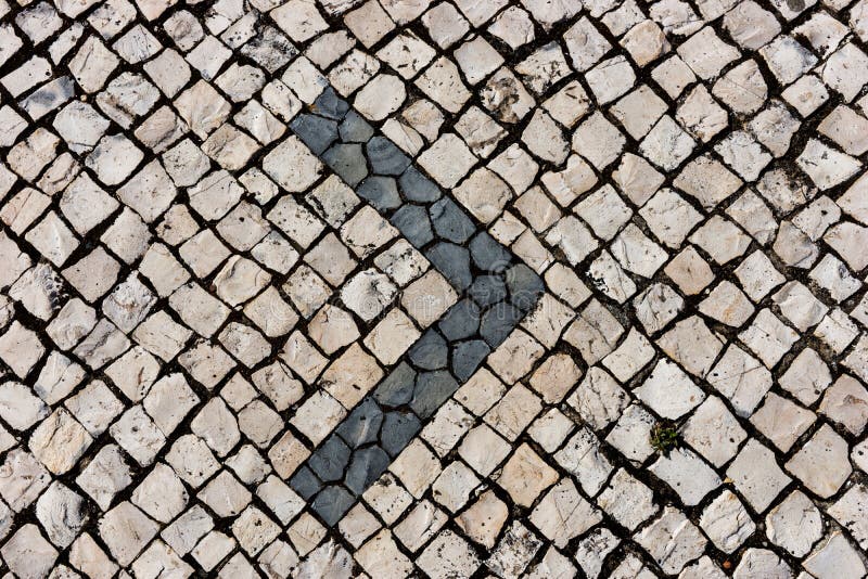 Arrow Black Sign Paint on a Brick Road Stock Image - Image of street ...