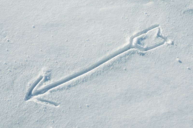 Arrow drawn on a snow stock image. Image of blue, snow - 59198763
