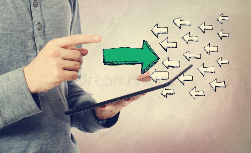 Arrow Facing in a Opposite Direction with Man Holding a Tablet Stock ...