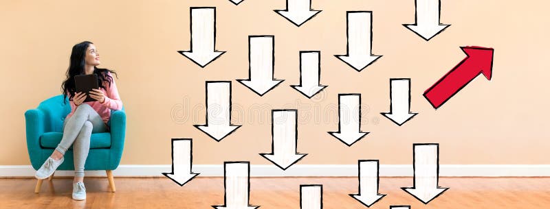 Arrow Going in a Different Direction with Woman Using a Tablet Stock ...