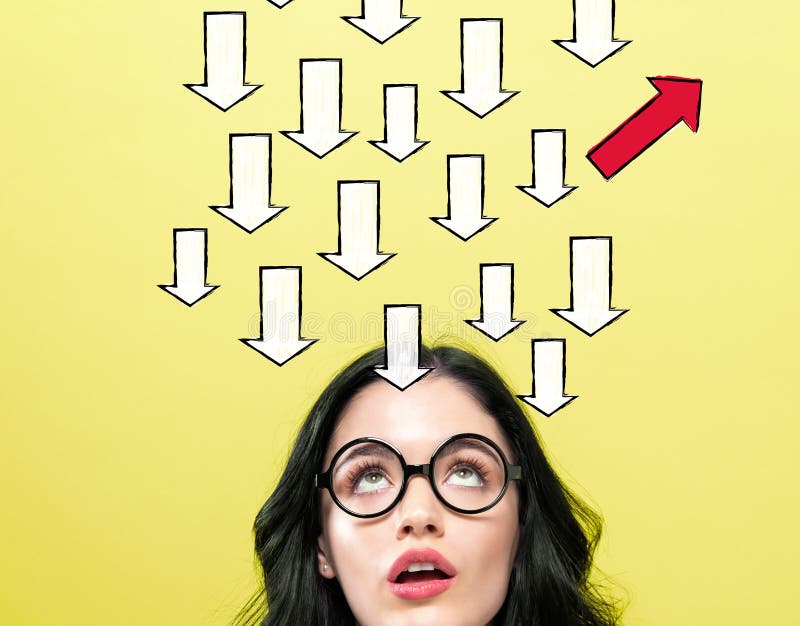 Arrow Going in a Different Direction with Young Woman Stock Image ...